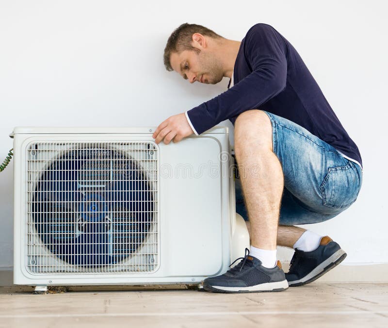 Man Installing Air-conditioning System Stock Photo - Image of engineer ... Man Installing Air-conditioning System Stock Photo - Image of engineer ...