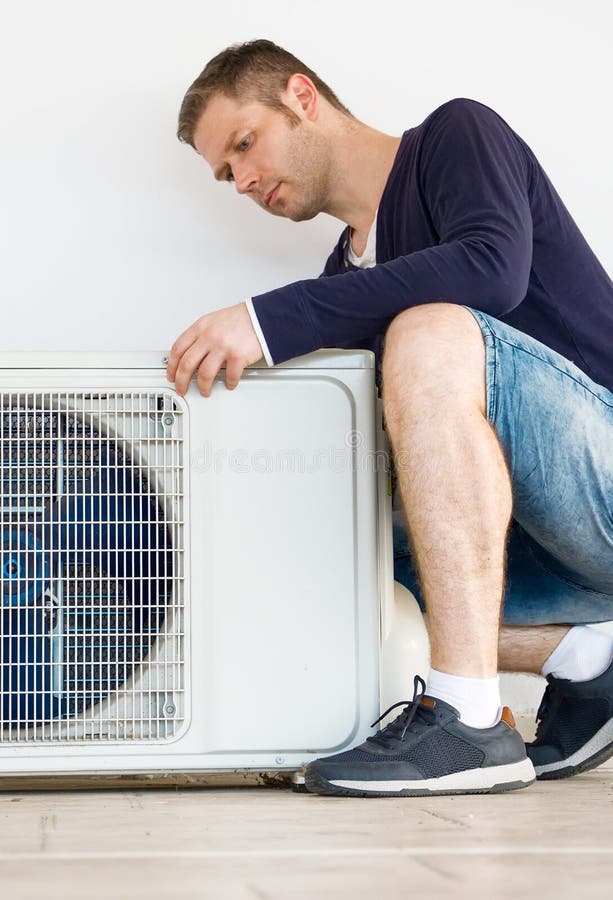 Man Installing Air-conditioning System Stock Photo - Image of installer ...
