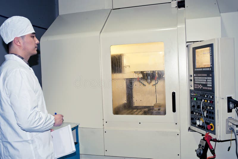 Male Technician Operating the Machine Stock Photo - Image of male ...