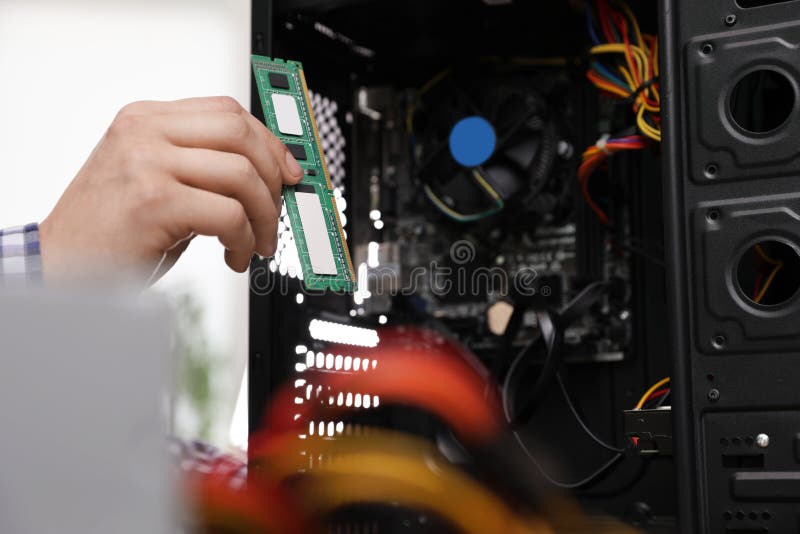 Male Technician Putting RAM Chip into System Unit, Closeup. Stock Photo ...