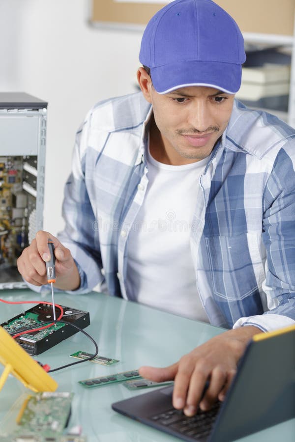 Male Technician Repairing Computer Stock Photo - Image of electrical ...