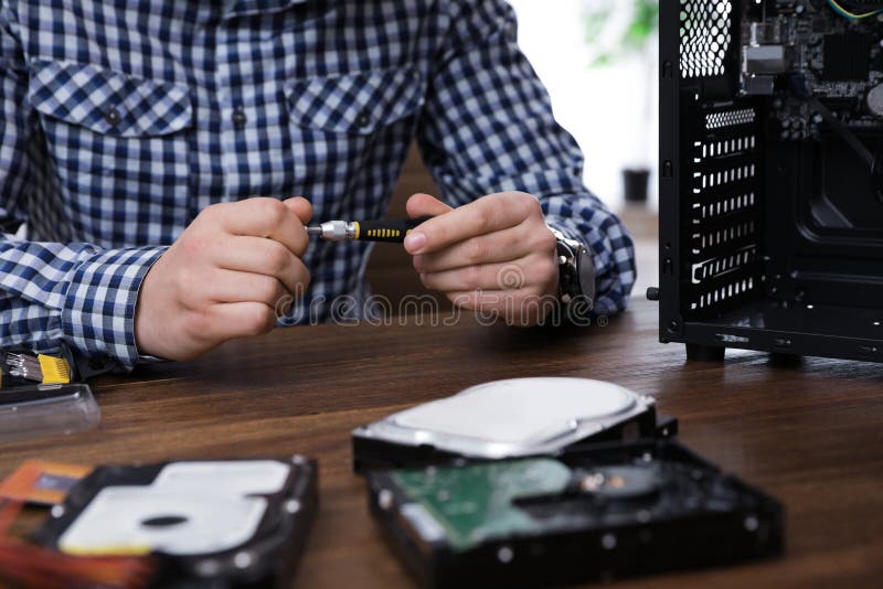 Male Technician Repairing Computer at Table Stock Image - Image of ...