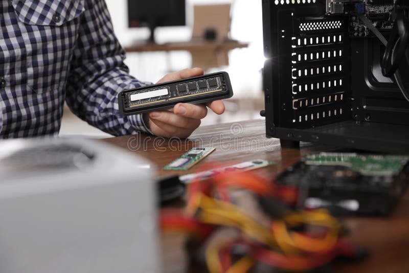 Male Technician Repairing Computer at Table Stock Image - Image of ...