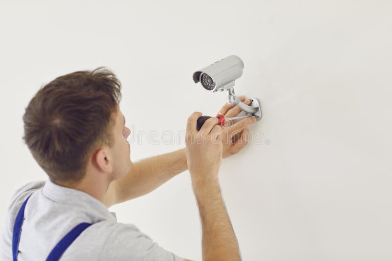 Portrait of Young Technician Man Installing Surveillance CCTV Camera on ...