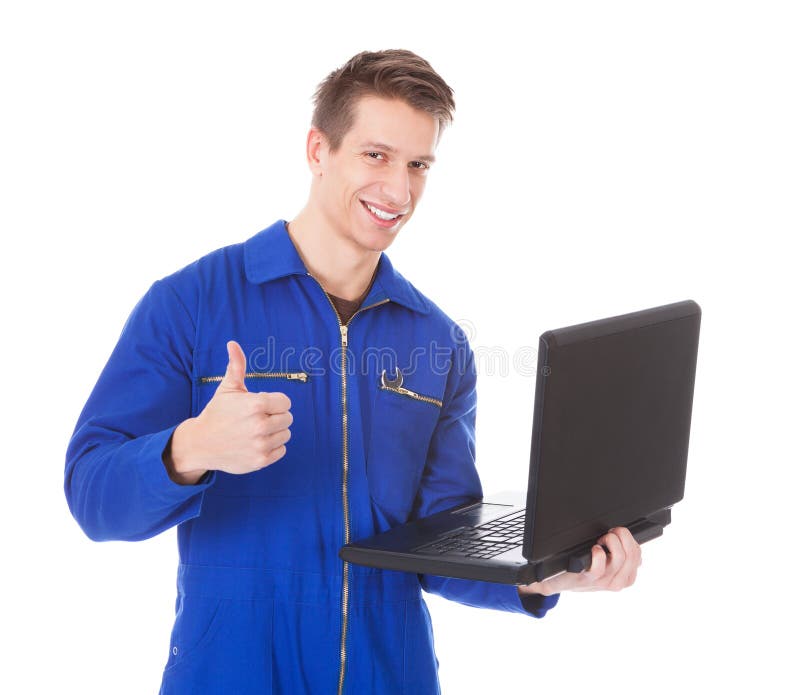 Male Technician Using Laptop Stock Photo - Image of industry, online ...