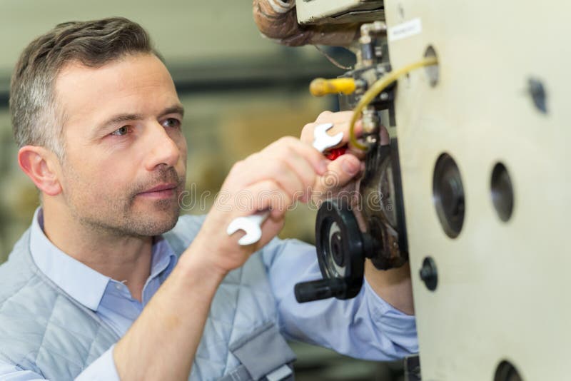 Male Technician Using Spanner Machinery Stock Photo - Image of spanner ...