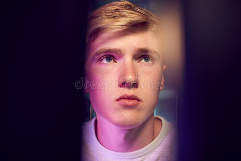 Male Teenage Hacker Sitting between Computer Screens Bypassing Cyber ...