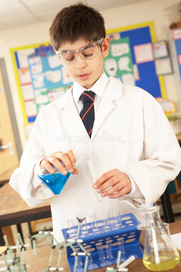 Male and Female Teenage Student in Science Class Stock Photo - Image of ...