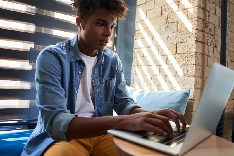 Male Texting at the Laptop at the Cafe Stock Image - Image of gadget ...
