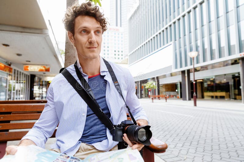 Male tourist in city stock image. Image of guide, attractive - 77059697