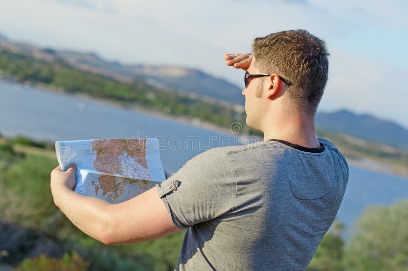 Male tourist with map. stock image. Image of hike, guide - 37534403