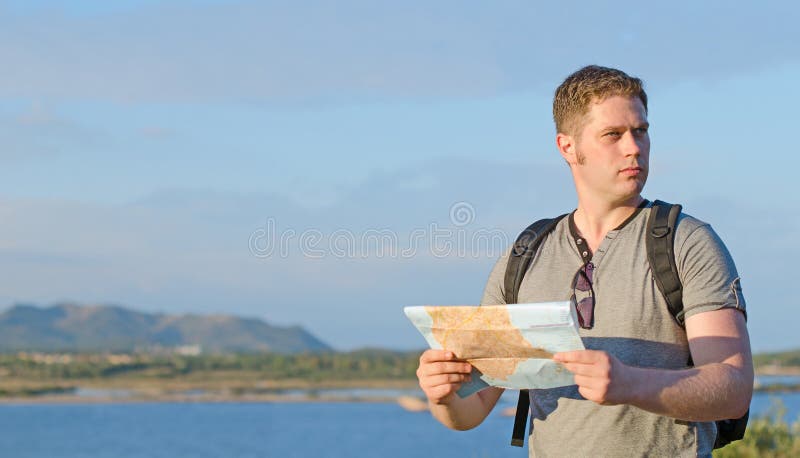 Male tourist with map. stock photo. Image of journey - 37534502