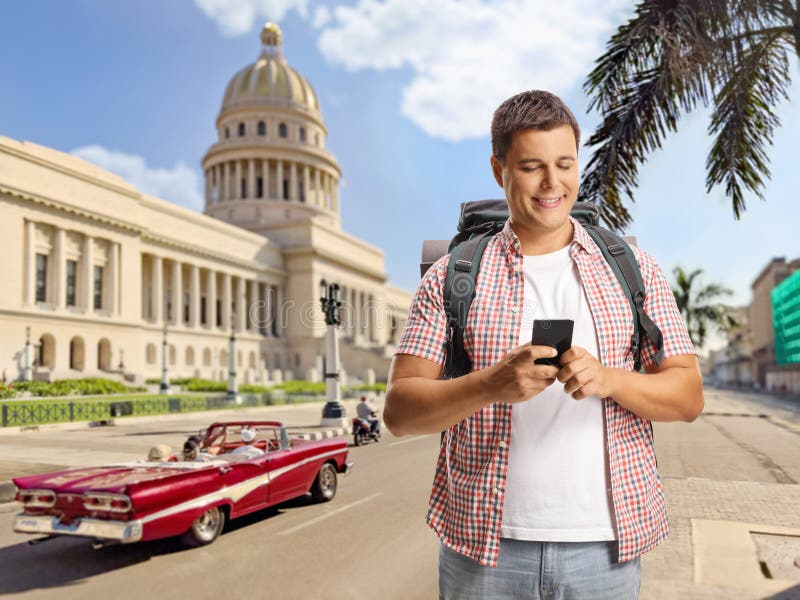 Male Tourist Using a Smartphone in Havana Stock Image - Image of ...