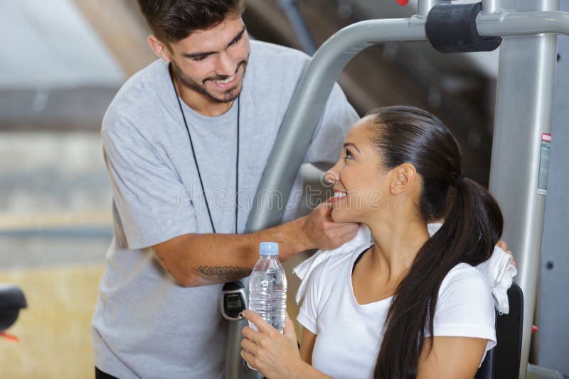 Male Trainer Flirting with Gym Client Stock Image - Image of male ... Male Trainer Flirting with Gym Client Stock Image - Image of male ...