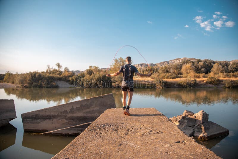 Male Training with a Jumping-rope Next To the River Stock Image - Image ...