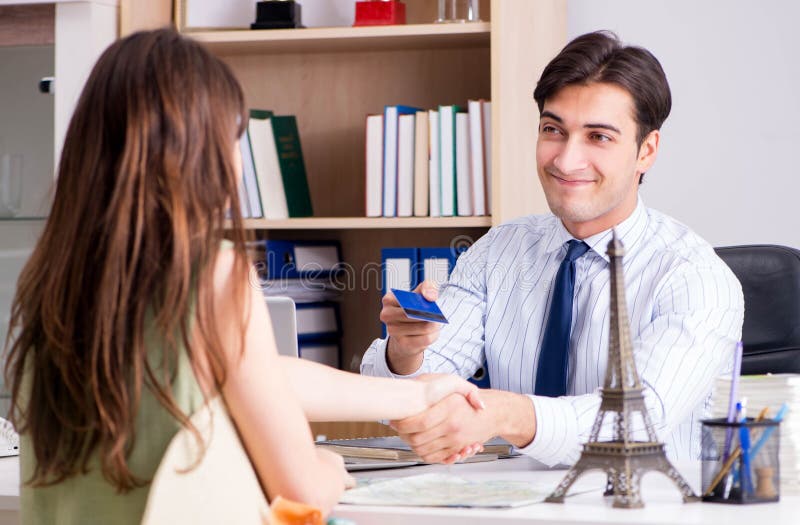 Male Travel Agent with Customer in Agency Stock Photo - Image of ...