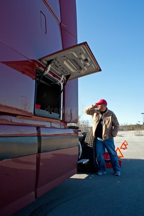 Male Truck Driver Calling for Help Via Cell Phone Stock Image - Image ...
