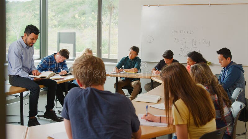 Male Tutor in Classroom Teaching High School College or University ...