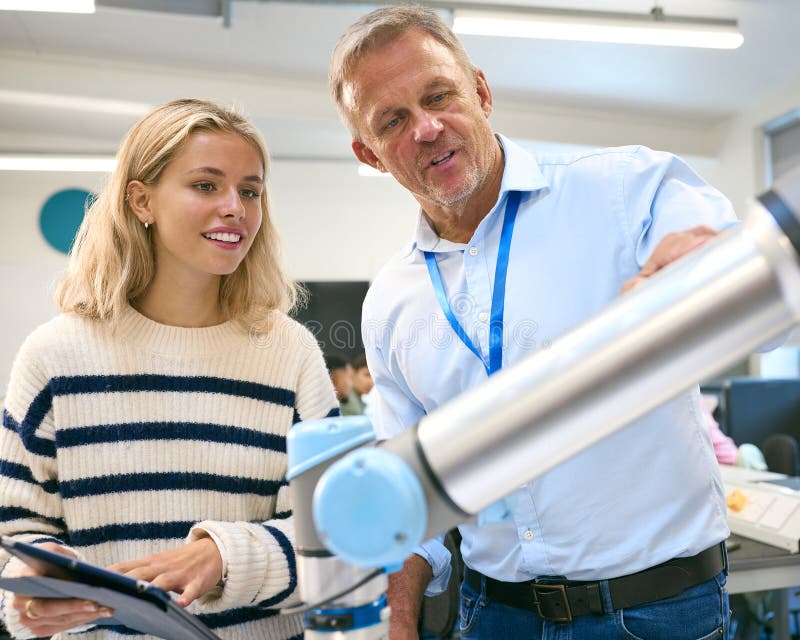 Male Tutor and Female College or University Engineering Student in ...