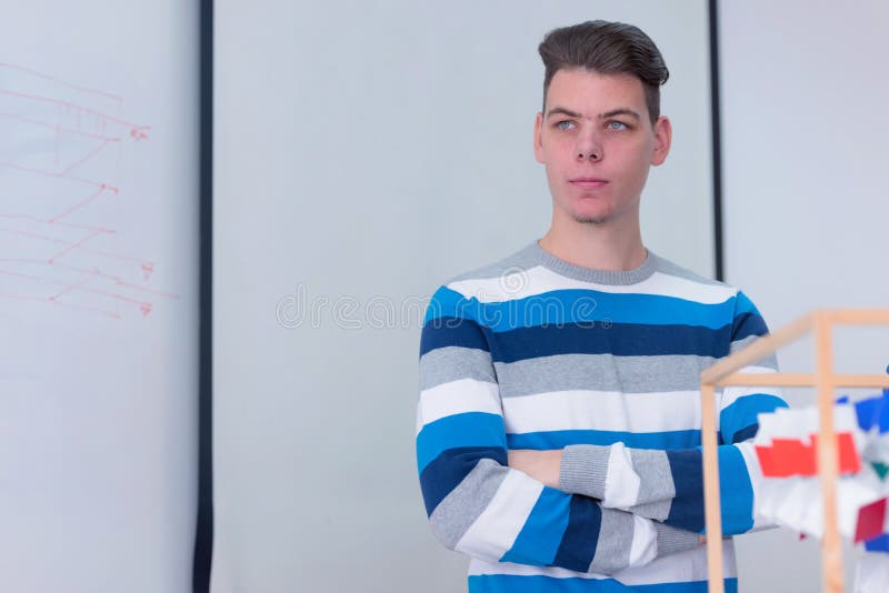 Male University Architecture Student Doing Practice Lesson during Class ...