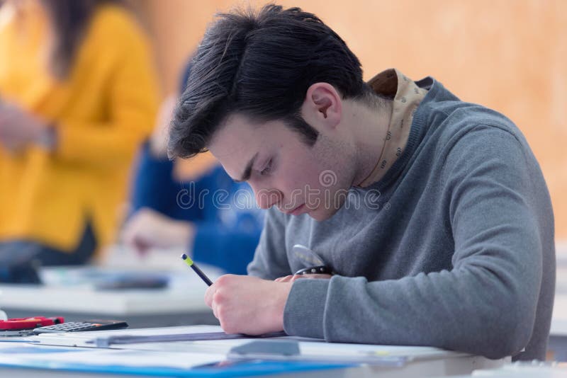 Male University Architecture Student Working on Practice Lessons ...