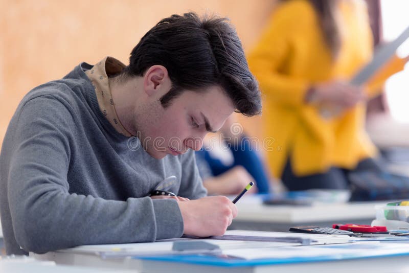 Male University Architecture Student Working on Practice Lessons ...