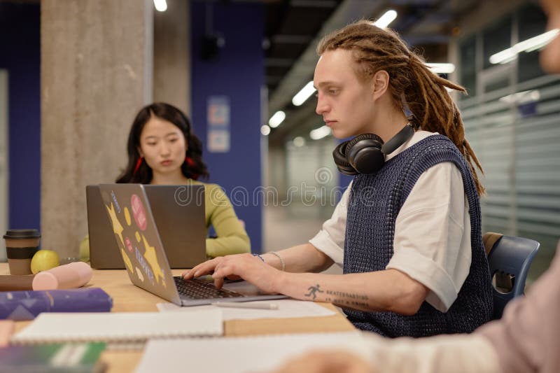 Male University Student Using Computer in Class Stock Image - Image of ...
