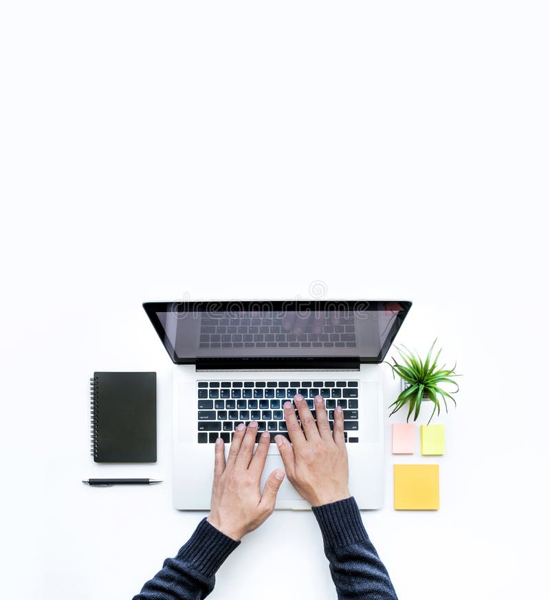 Male Using Computer Laptop and Smart Phone in Office. Stock Photo ...