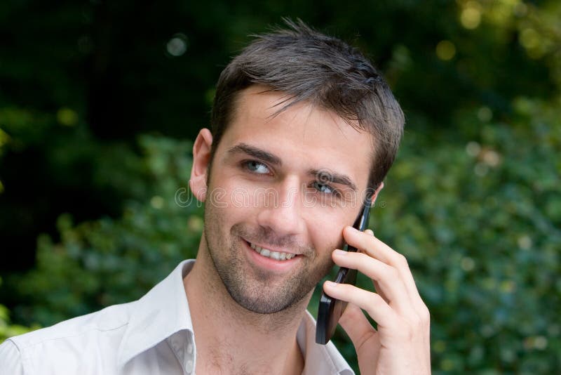Male Using Mobile Phone stock photo. Image of deal, hair - 2947864