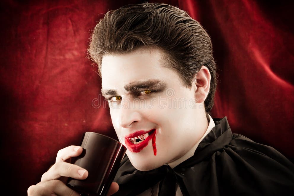 Male Vampire Drinking Blood Smiling Stock Photo - Image of cellar, face ...