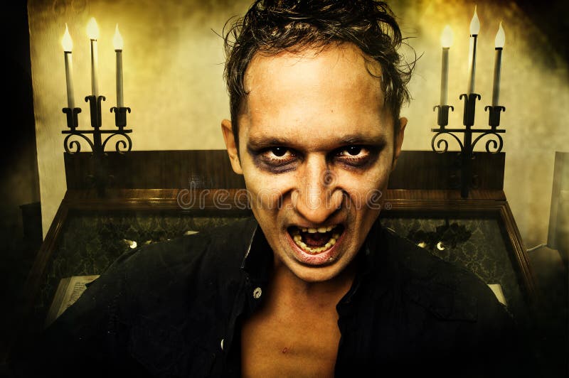 Male Vampire with Evil Eyes Stock Photo - Image of halloween, fang ...