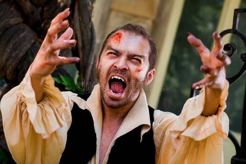 Male vampire roaring stock image. Image of costume, dark - 21875795