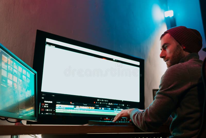 Male Video Editor Working on His Personal Computer with Big Blank ...