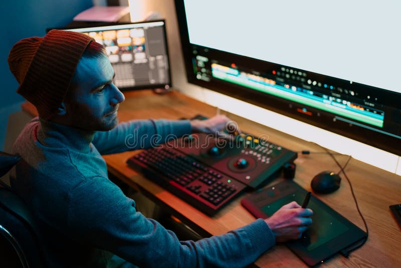 Male Video Editor Working on His Personal Computer with Big Blank ...