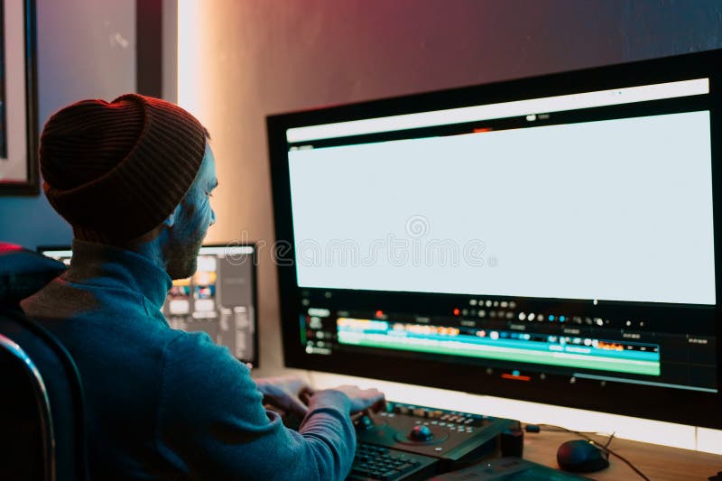 Male Video Editor Working on His Personal Computer with Big Blank ...