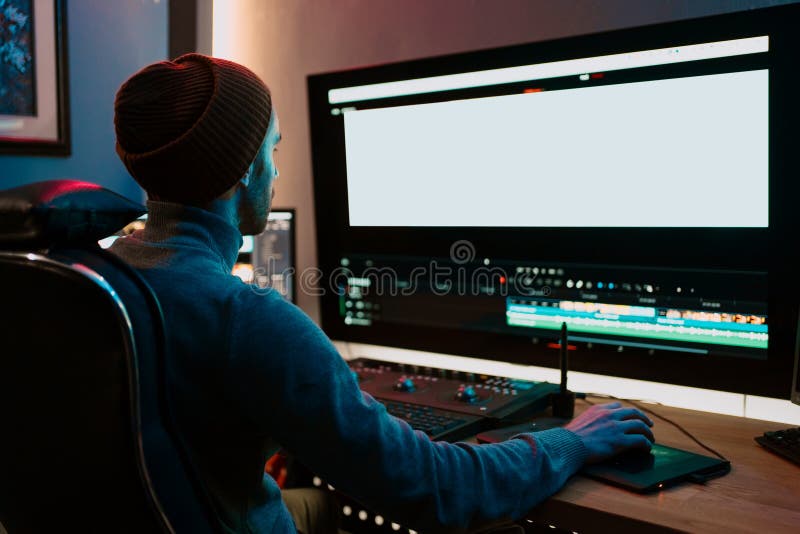 Male Video Editor Working on His Personal Computer with Big Blank ...