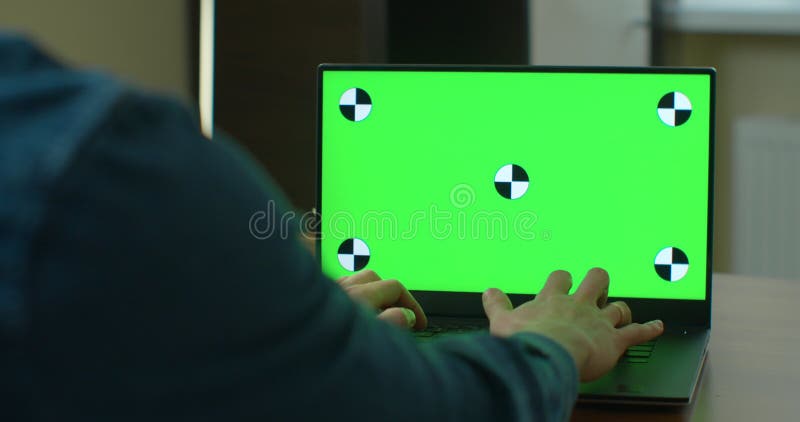 Male Video Editor Works on His Personal Computer with Green Screen Mock ...
