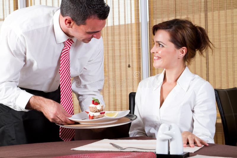 Male waiter brings dessert stock image. Image of bringing - 14985987