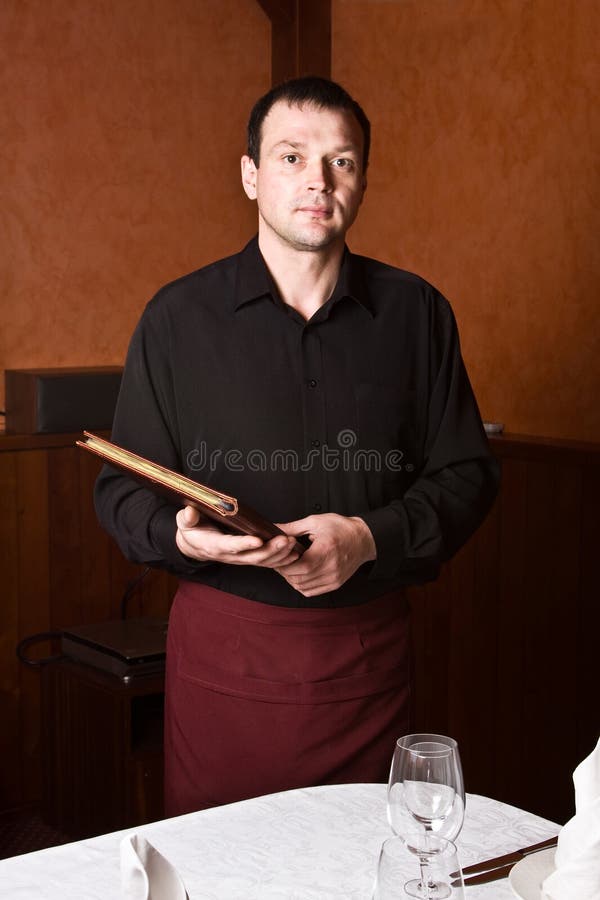 Male Waiter with the Folder Menu at the Hands Stock Photo - Image of ...