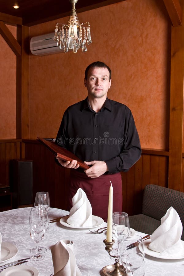 Male Waiter with the Folder Menu at the Hands Stock Photo - Image of ...