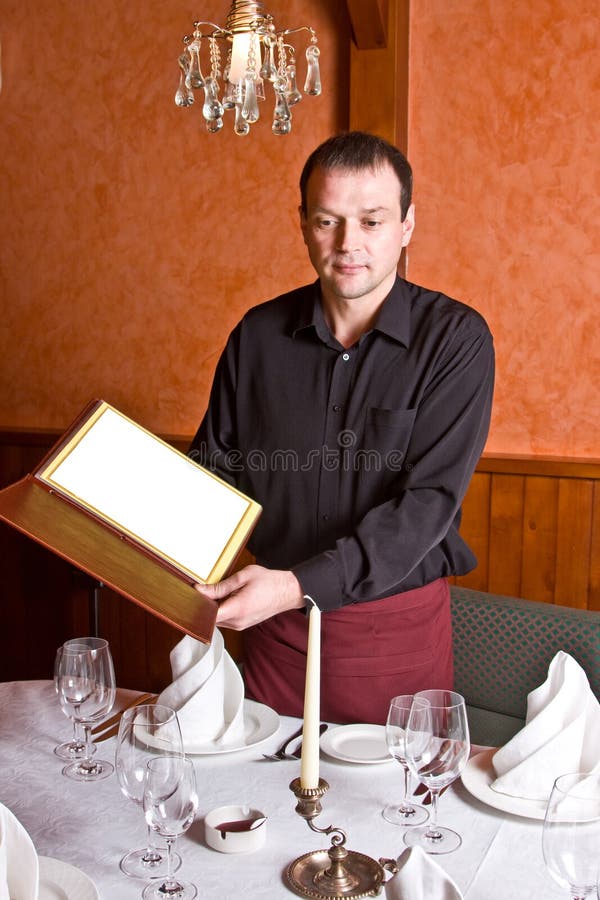 Male Waiter with the Folder Menu at the Hands Stock Photo - Image of ...