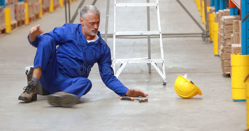 Male Warehouse Worker Falling Off Ladder while Working Stock Video ...