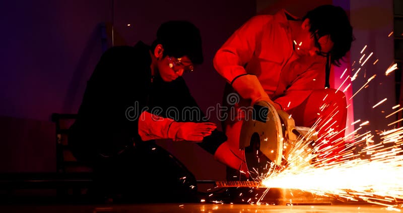Male Welders Working Together at Site Stock Photo - Image of protection ...