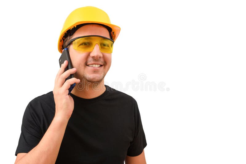 Yellow Construction Helmet and Level on a White Background ...