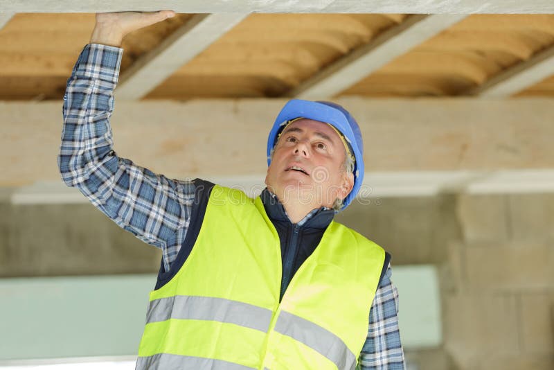 Male Worker Checking Ceiling Stock Photo - Image of improvement, chores ...