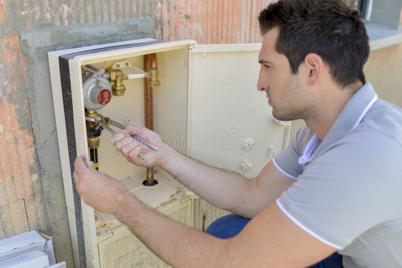 Male Worker Checking Water Meter Stock Image - Image of equipment ...