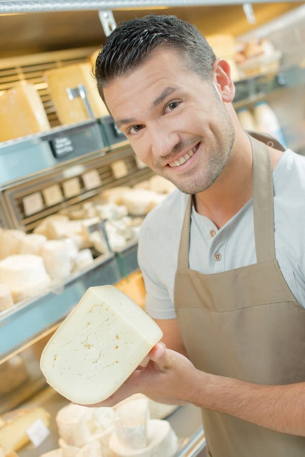 Male worker with cheese stock photo. Image of proud - 246349150