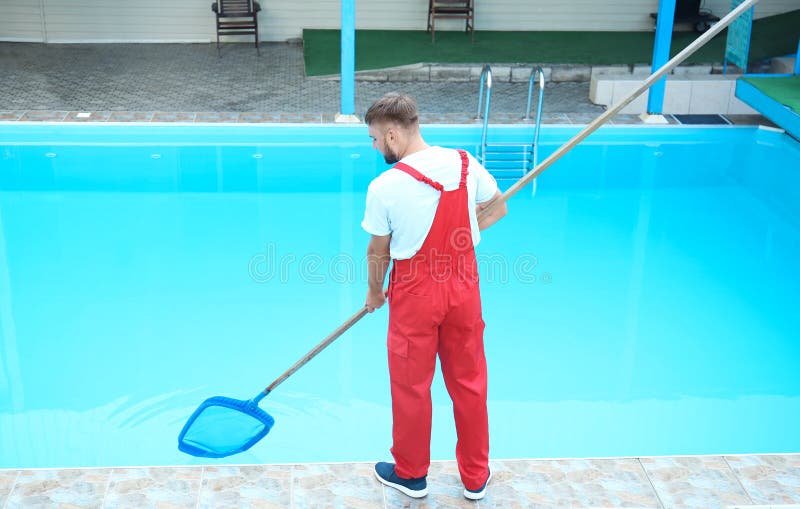 Male Worker Cleaning Outdoor Pool with Net Stock Image - Image of ...