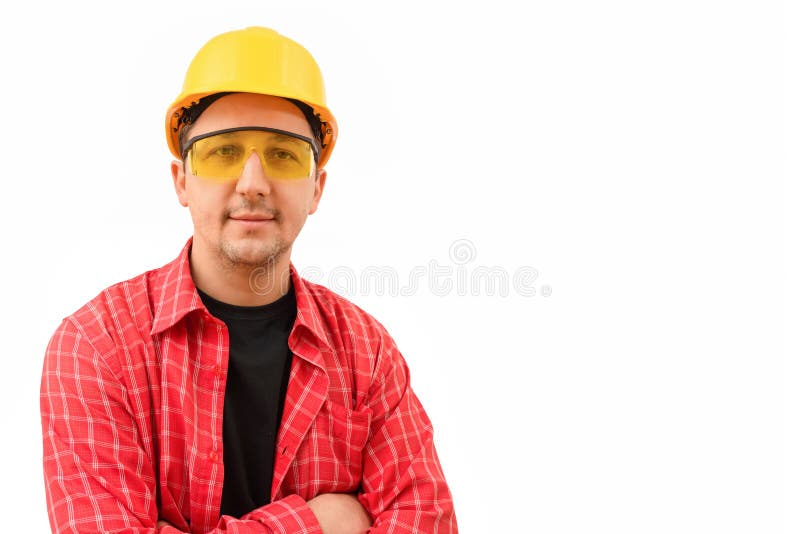 Yellow Construction Helmet and Level on a White Background ...