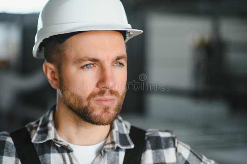 Male worker at a factory stock photo. Image of portrait - 334801668